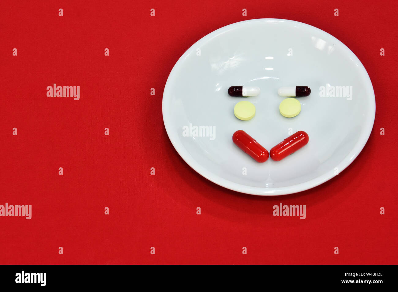 Happy face expression made of medicine. pain medication tablets ...