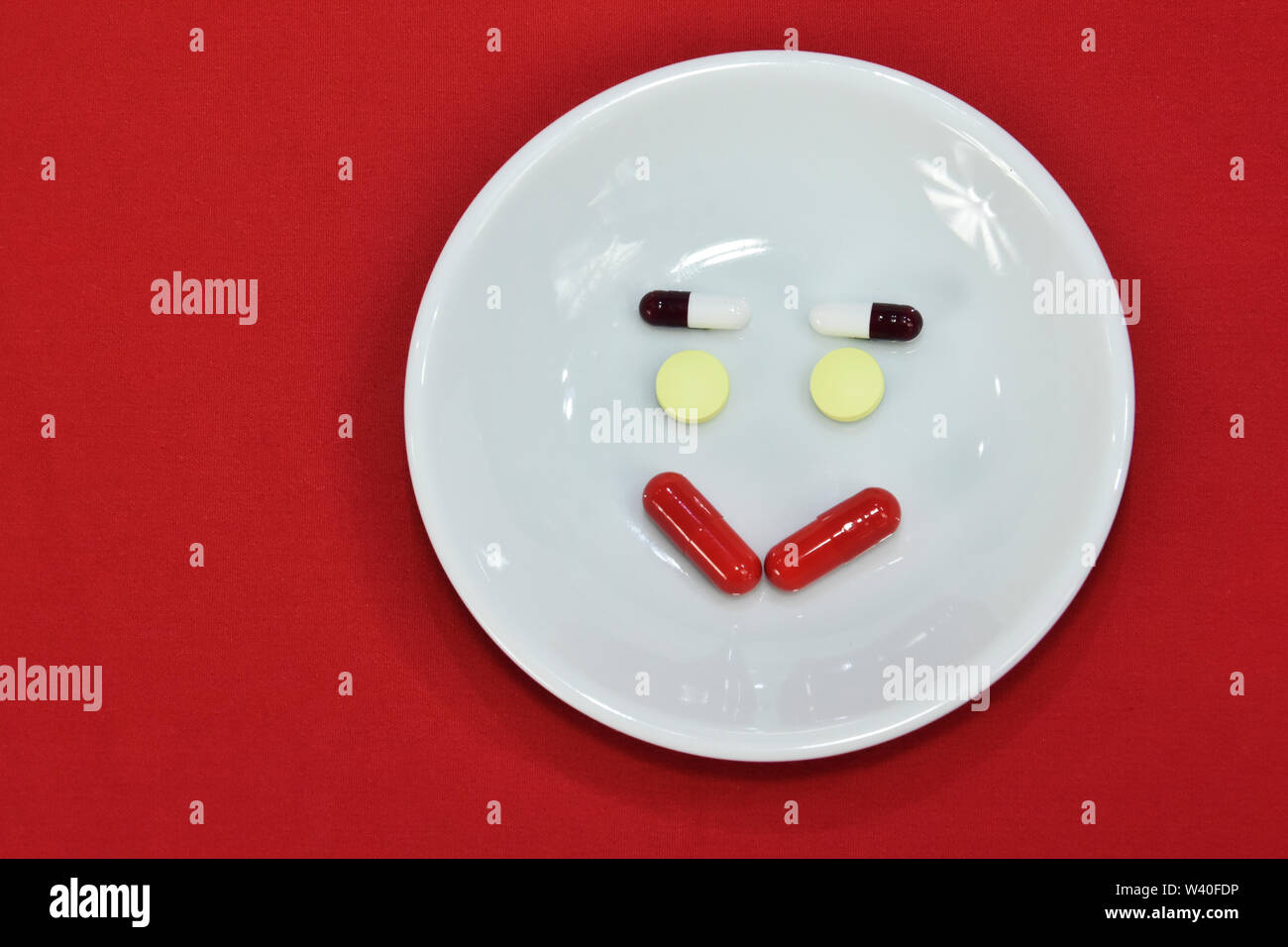 Happy face expression made of medicine. pain medication tablets ...