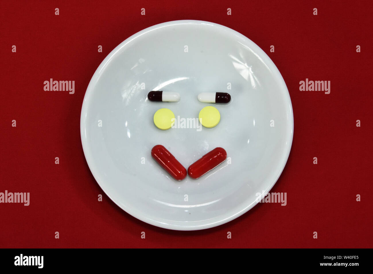 Happy face expression made of medicine. pain medication tablets ...