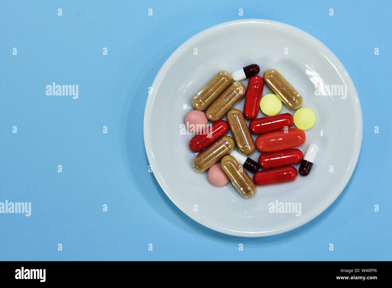High doses of medicine for treatment. pain medication tablets. colored ...