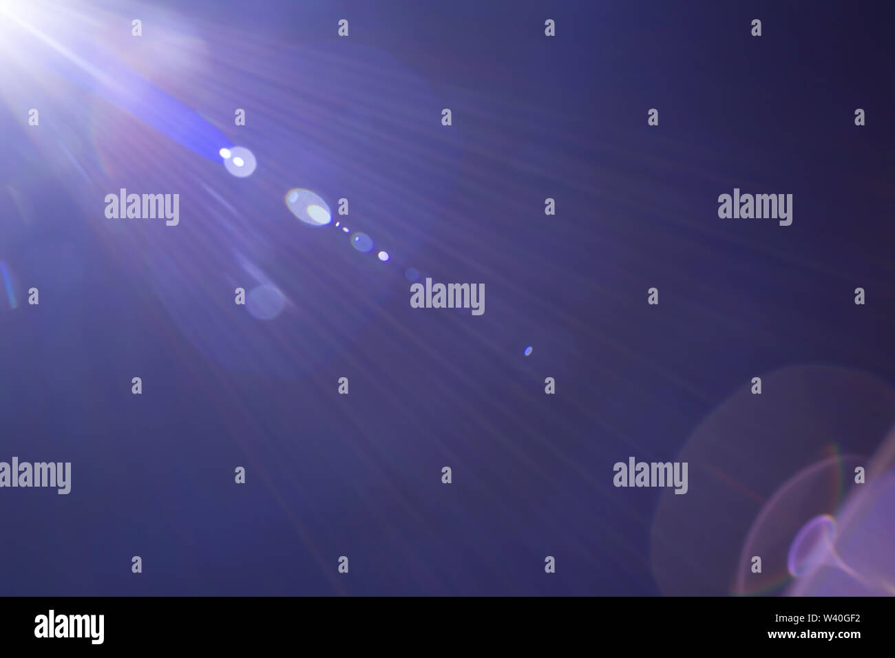 Solar camera lens flare light create hexagon of objective iris shapes ...