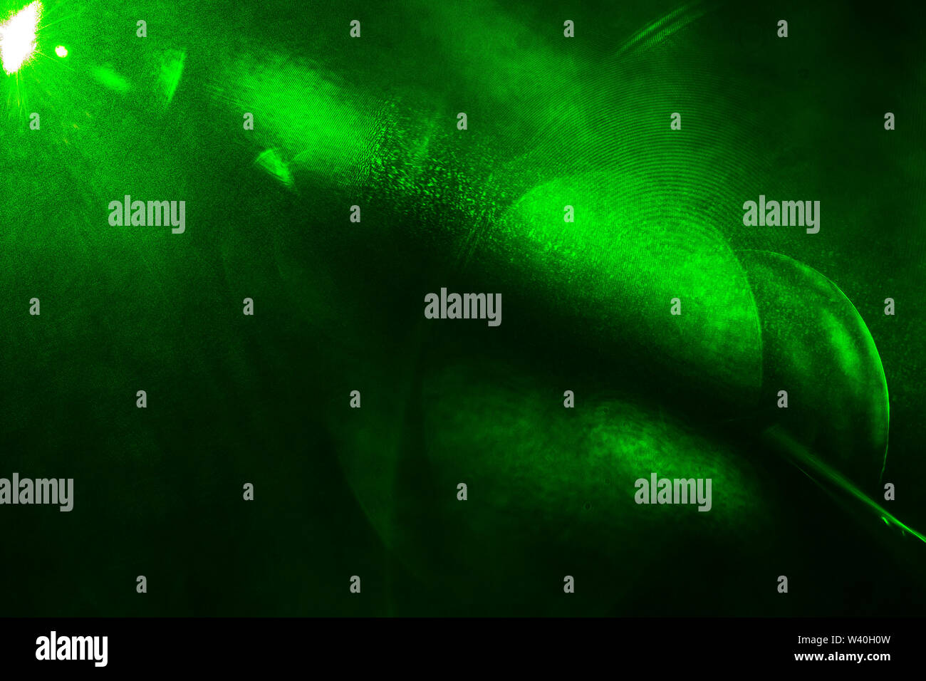 Camera lens flare by laser light create hexagons of objective iris ...