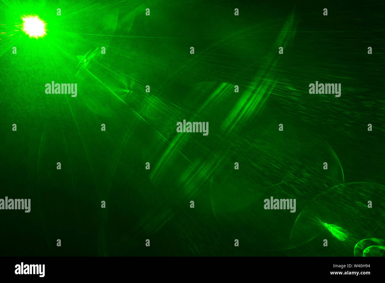 Camera lens flare by laser light create hexagons of objective iris ...