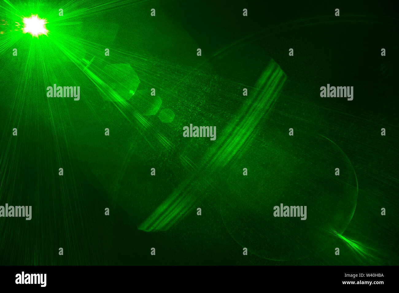 Camera lens flare by laser light create hexagons of objective iris ...