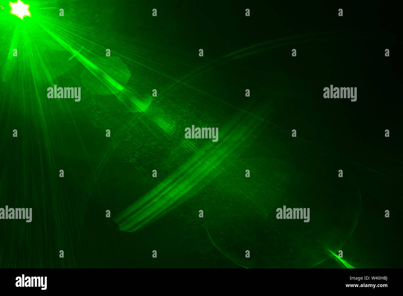 Camera lens flare by laser light create hexagons of objective iris ...
