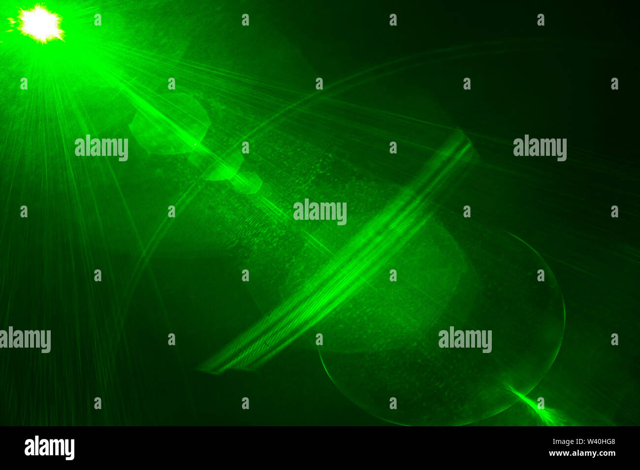 Camera lens flare by laser light create hexagons of objective iris ...
