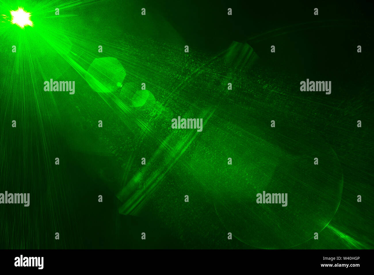 Camera lens flare by laser light create hexagons of objective iris ...