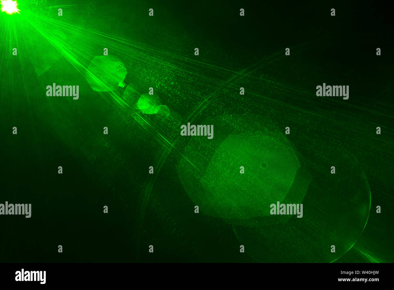 Camera lens flare by laser light create hexagons of objective iris ...