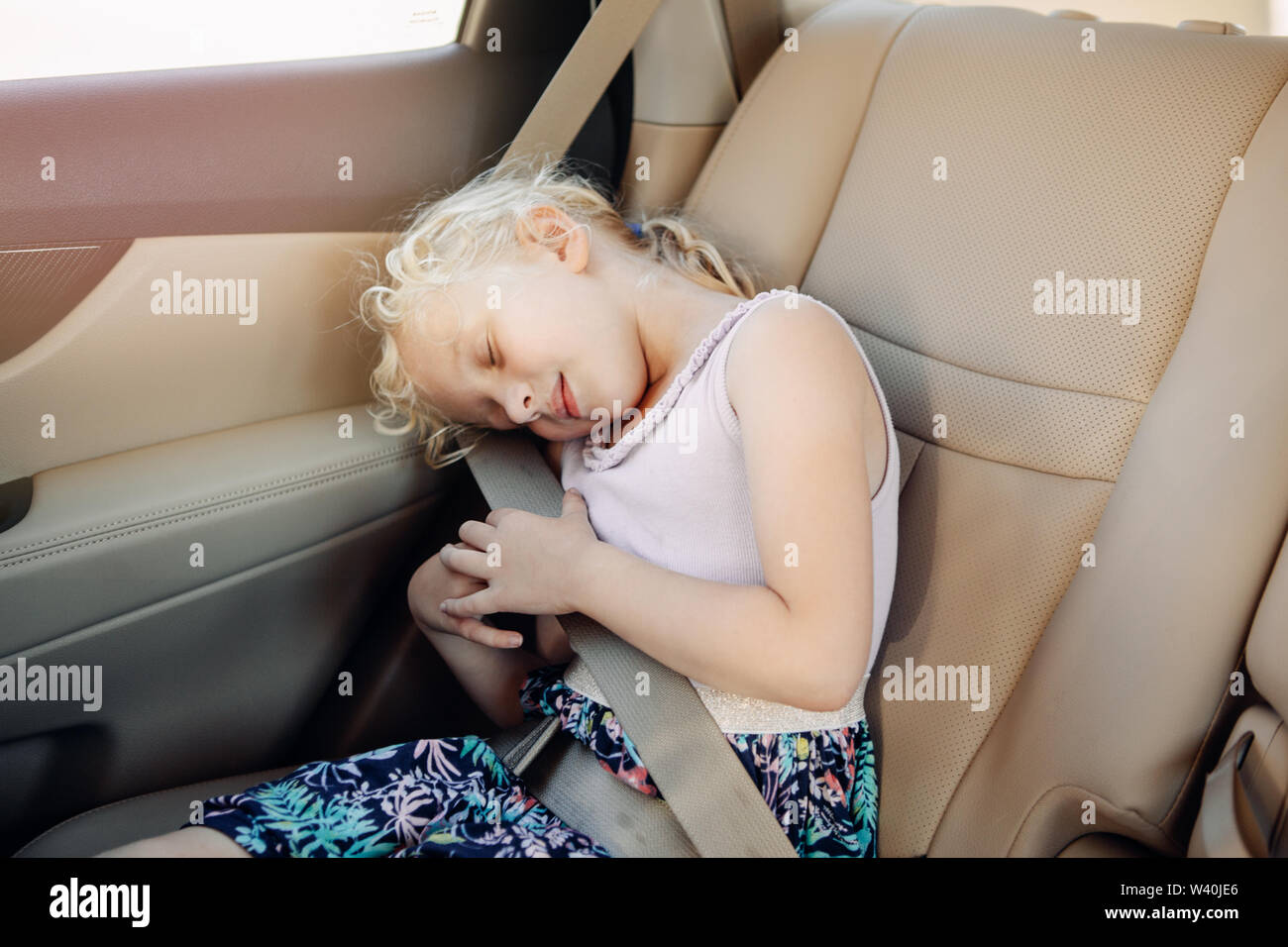 Girl Sleeping In Car High Resolution Stock Photography and Images - Alamy
