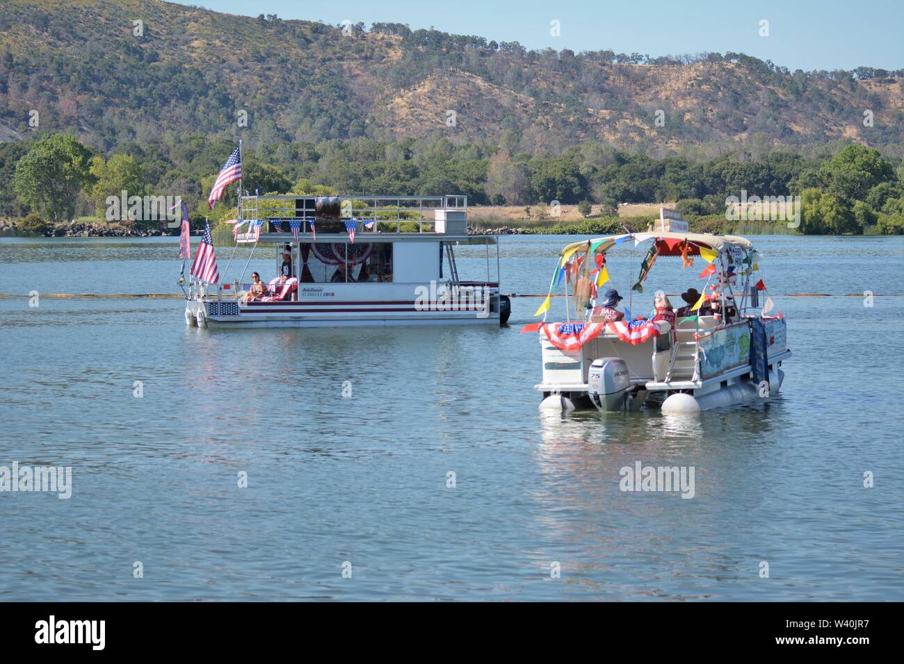People celebrating on real party boats on July 4 in California clear ...
