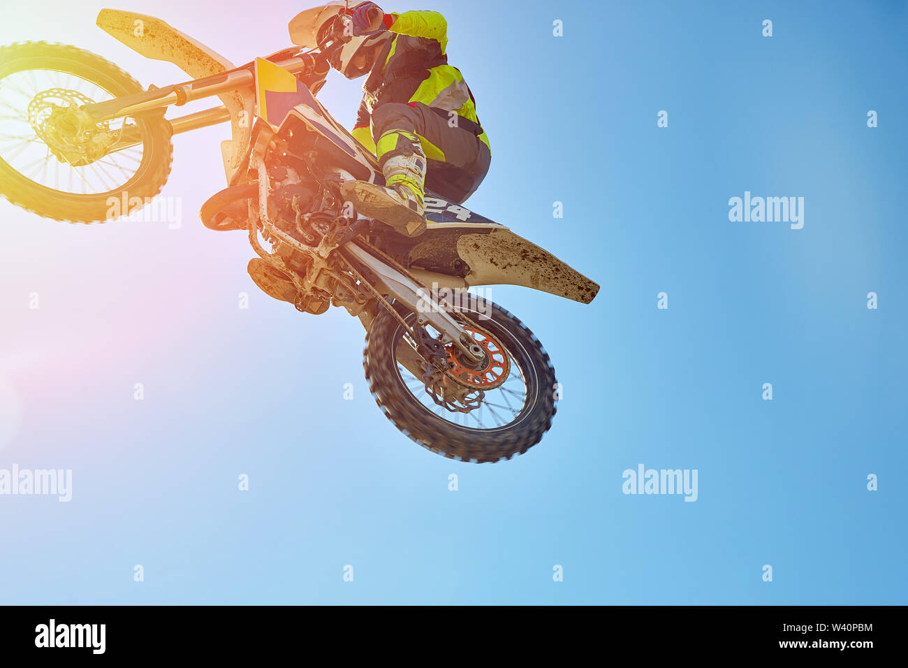 Biker does the trick and jumps in the air. Extreme concept, adrenaline ...