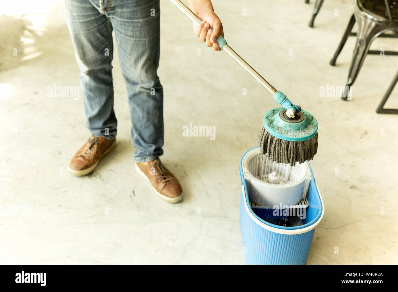 Mopping floor cafe hi-res stock photography and images - Alamy
