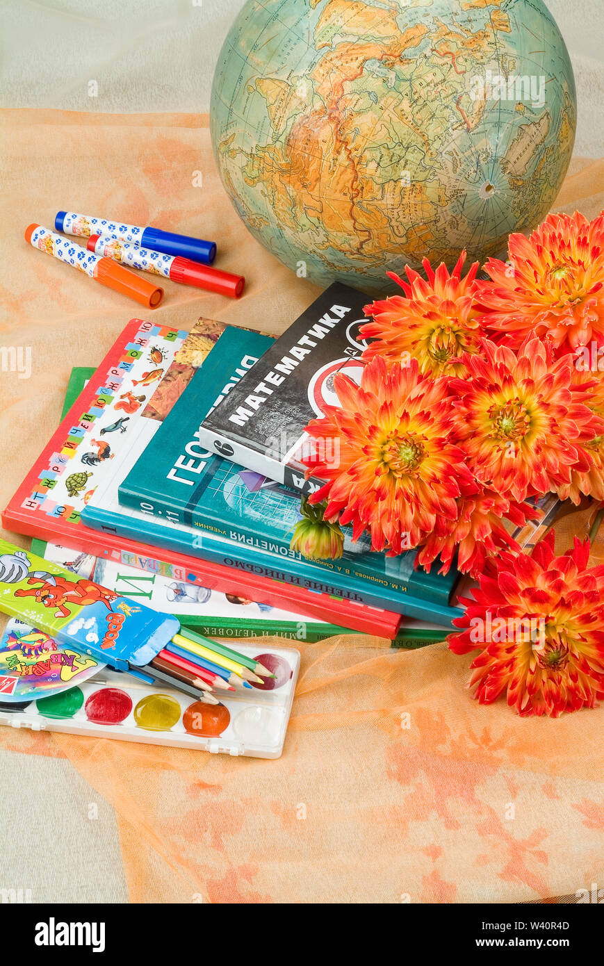 School books and accessories on a studio background Stock Photo - Alamy