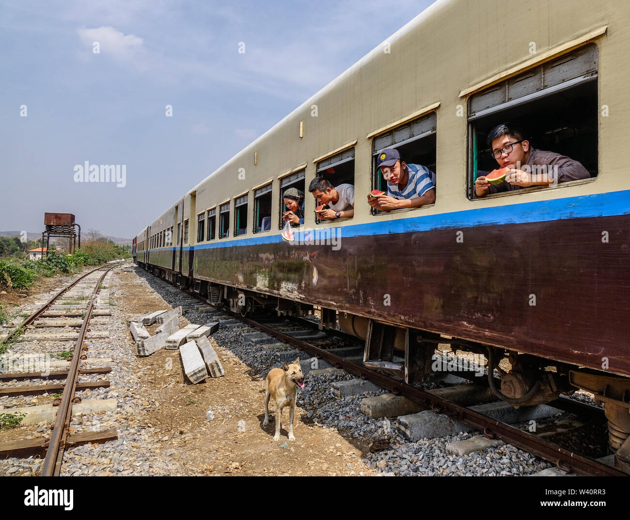 Mandalay, Myanmar - Feb 23, 2016. Passengers on the train at rural ...