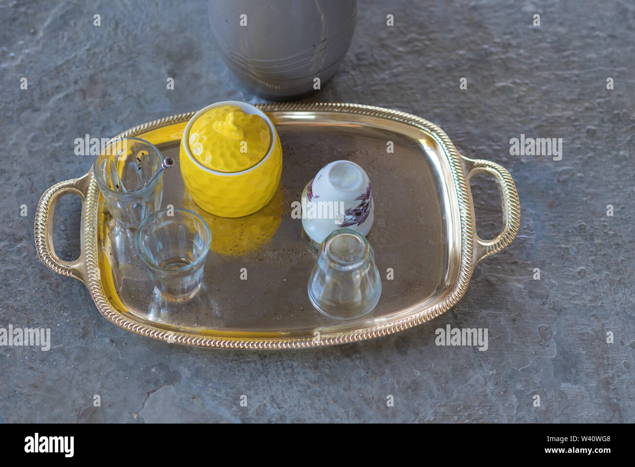 After party. A tray and empty Dirty coffee cup, Dirty tea glass, sugar ...