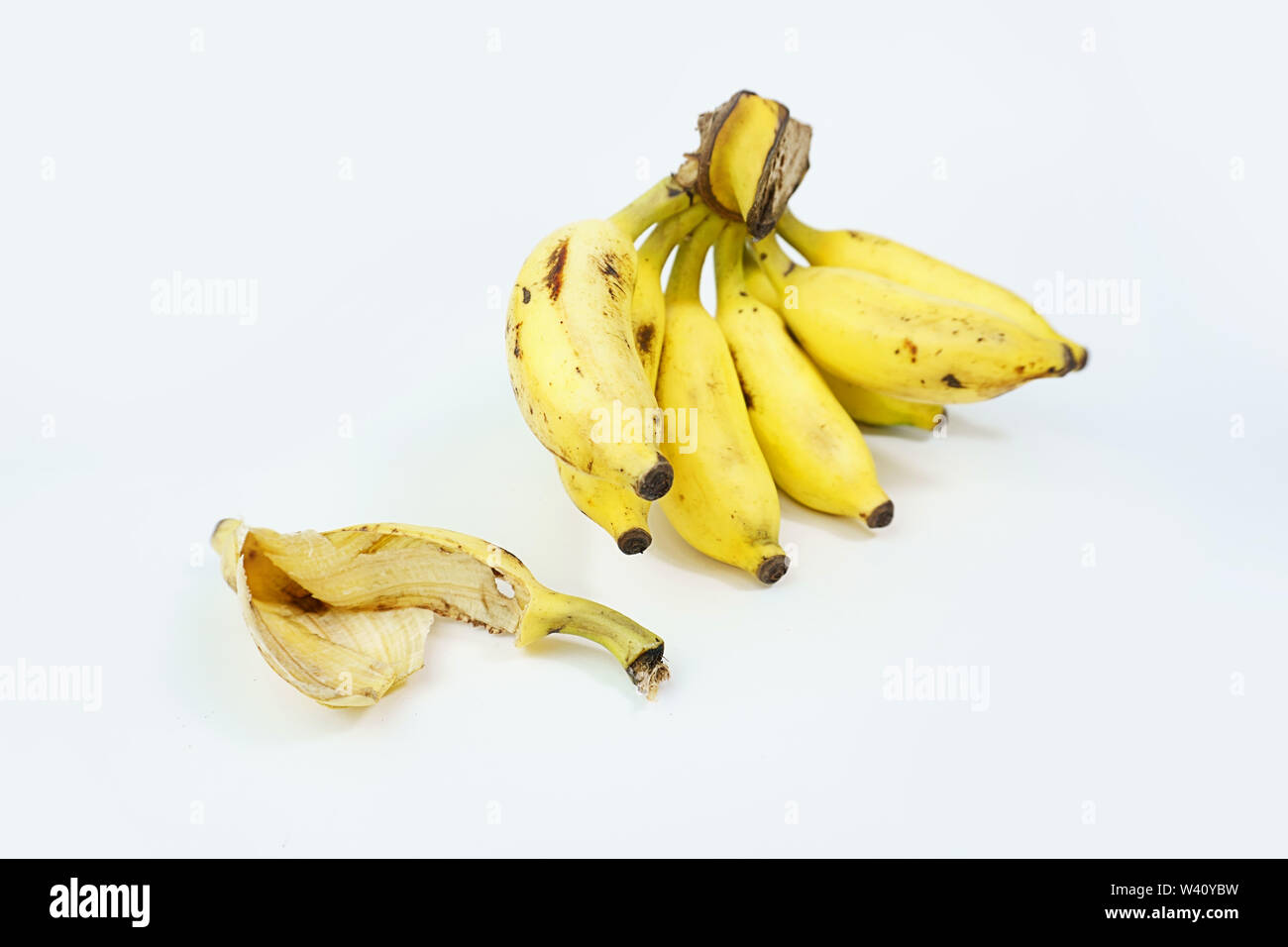 Small Yellow Bananas isolated on white background Stock Photo - Alamy