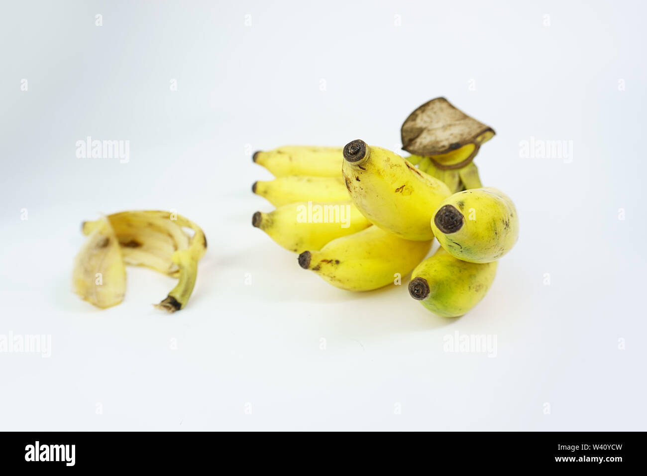 Small Yellow Bananas isolated on white background Stock Photo - Alamy