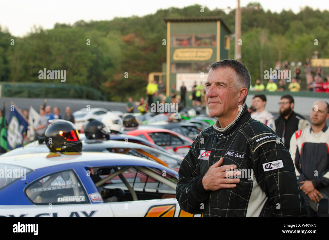Racing Governor Vermont Governor Phil Scott puts his hand on his heart ...