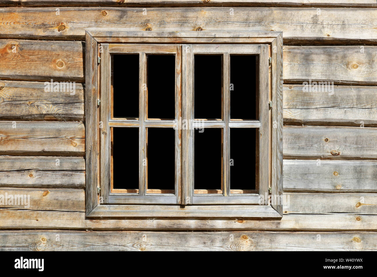 Rustic style aged window in wooden village rural home wall. Glass ...