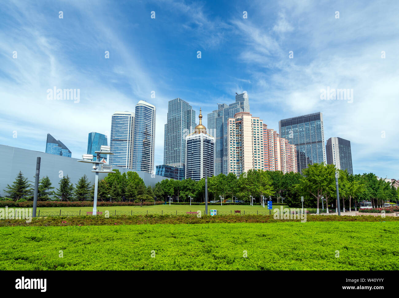 High-rise buildings near the lawn, Qingdao, China Stock Photo - Alamy