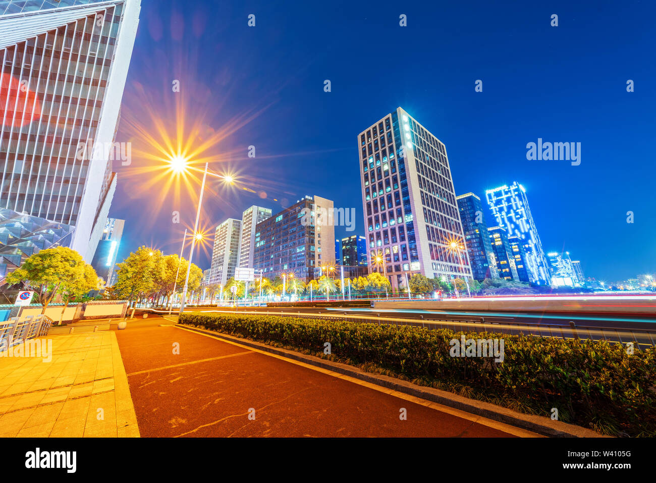 Modern city skyline, Ninbo, China at night Stock Photo - Alamy