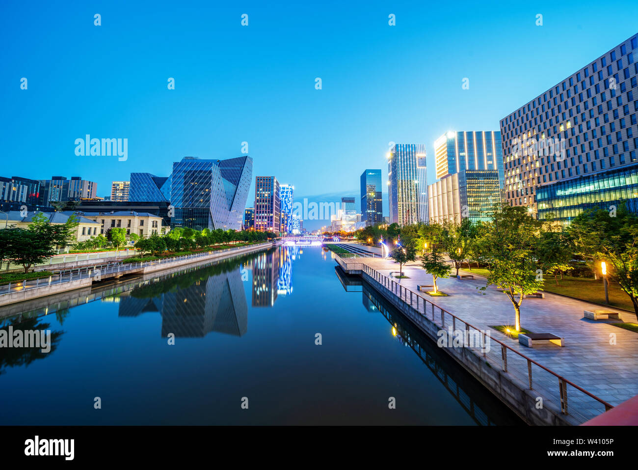 Modern city skyline, Ninbo, China at night Stock Photo - Alamy