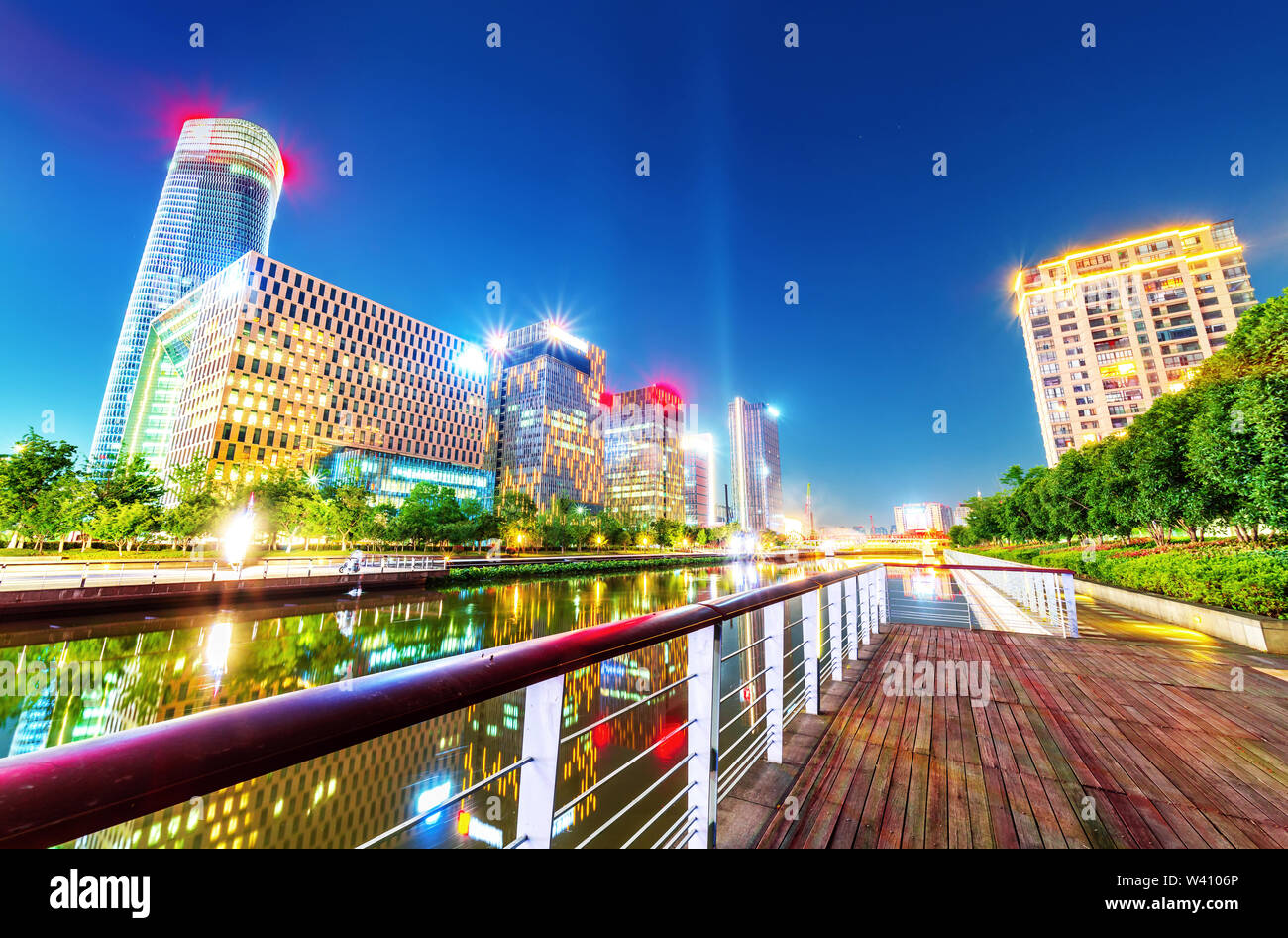 Modern city skyline, Ninbo, China at night Stock Photo - Alamy