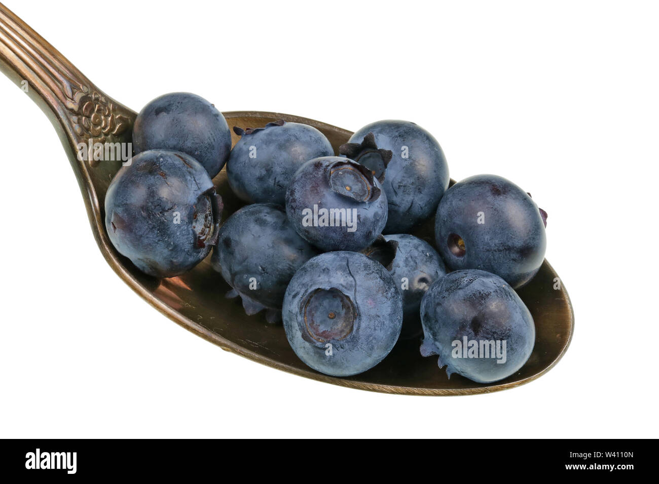 In the old golden spoon there is a small pile of food - ripe ...