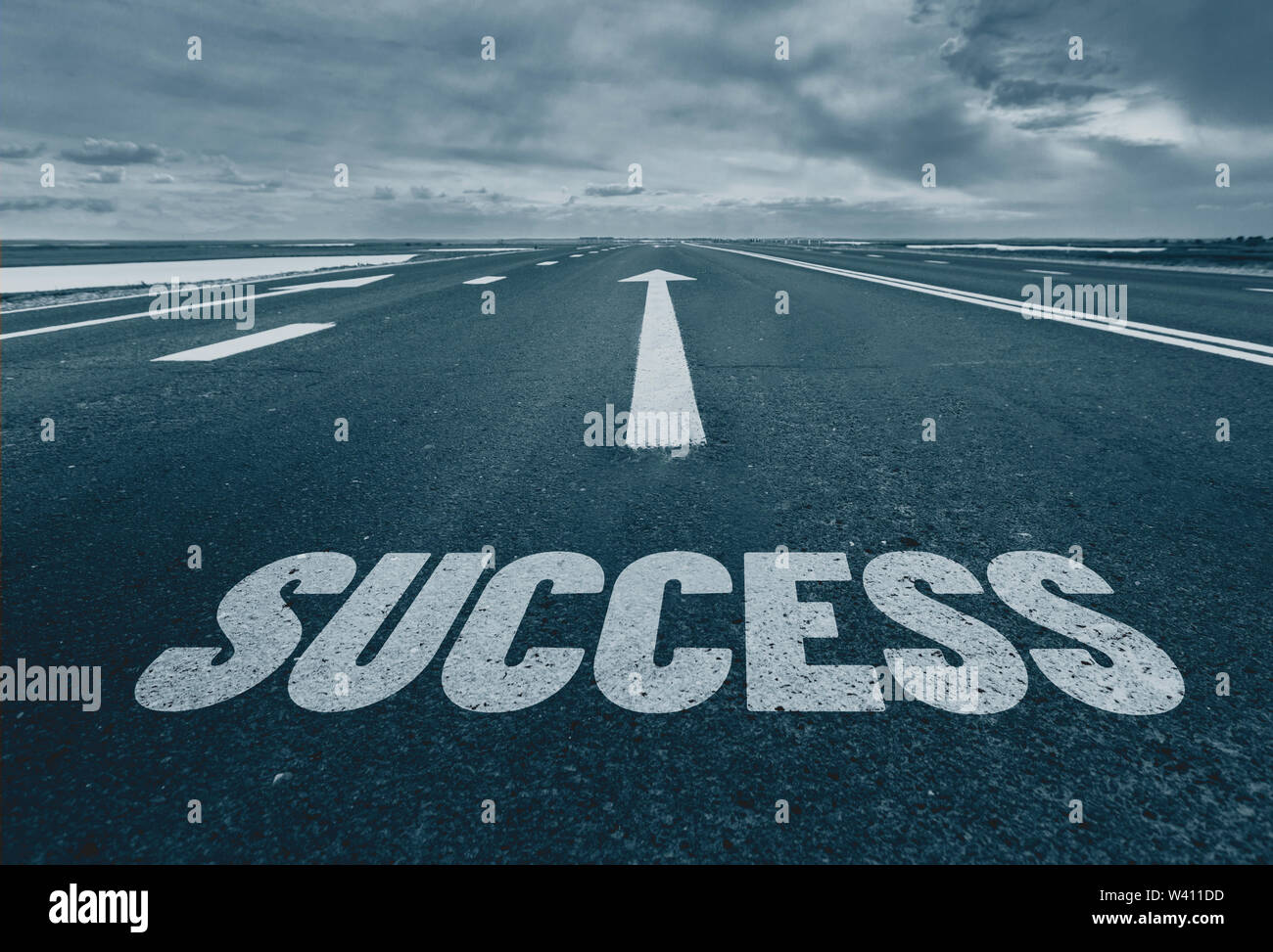 Desert road with text SUCCESS Stock Photo - Alamy