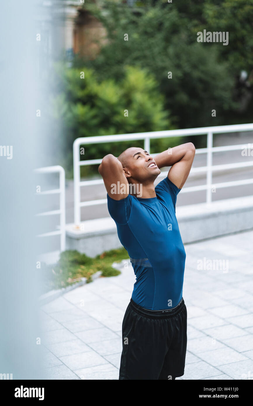 Image of handsome young strong sports man posing outdoors Stock Photo ...