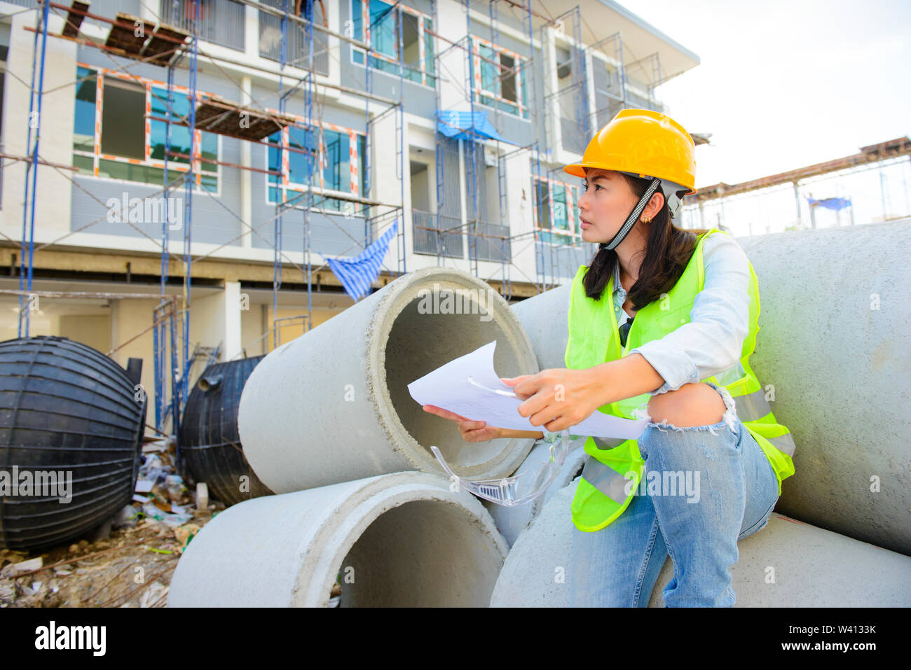 Asian female construction site engineer Stock Photo - Alamy