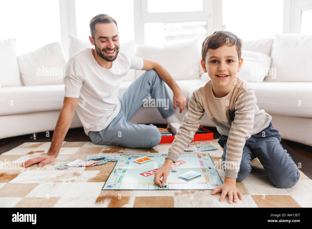 Family playing monopoly hi-res stock photography and images - Alamy