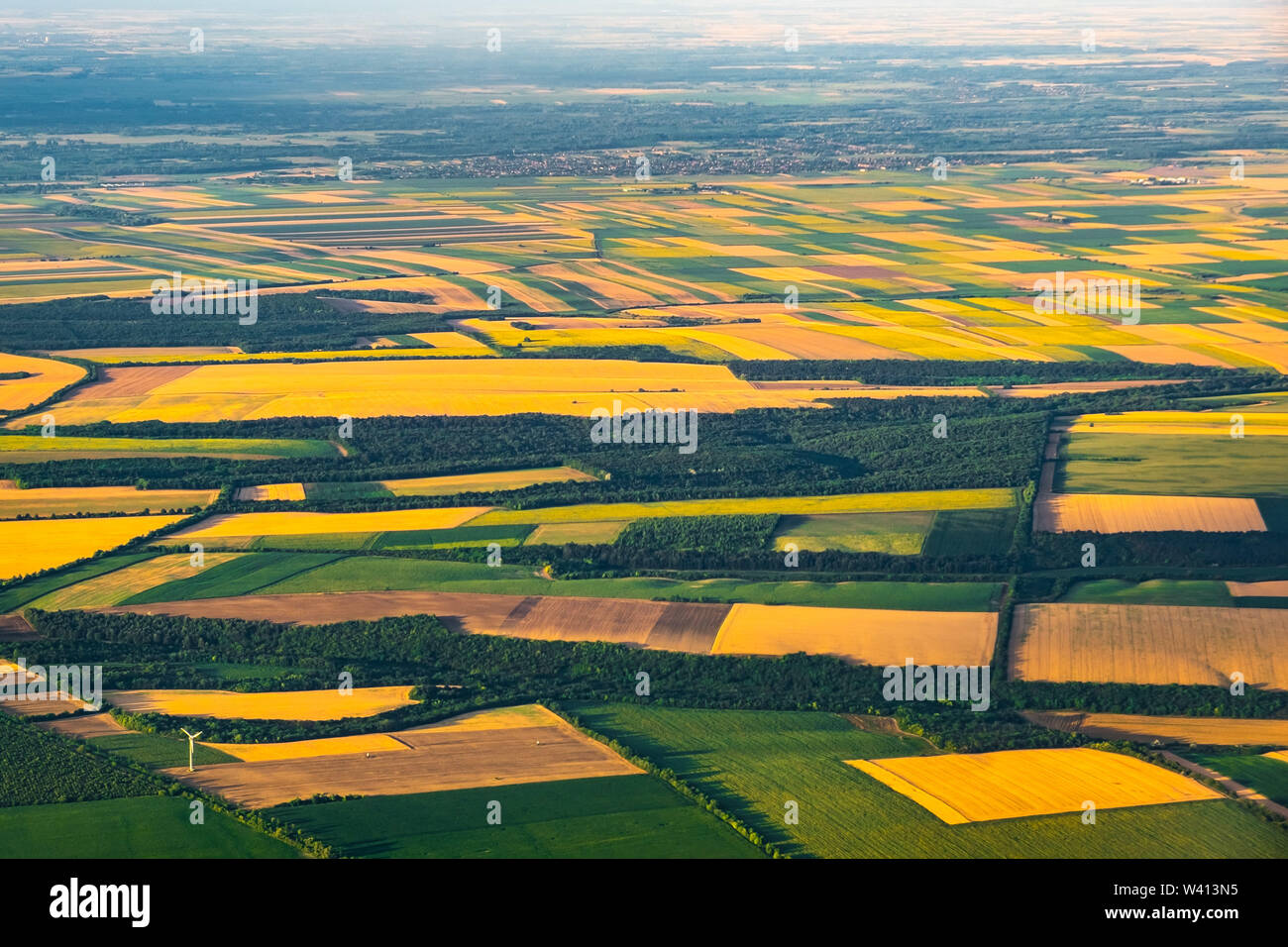 Aeriall view of patchwork of yellow and green fields in China Stock ...