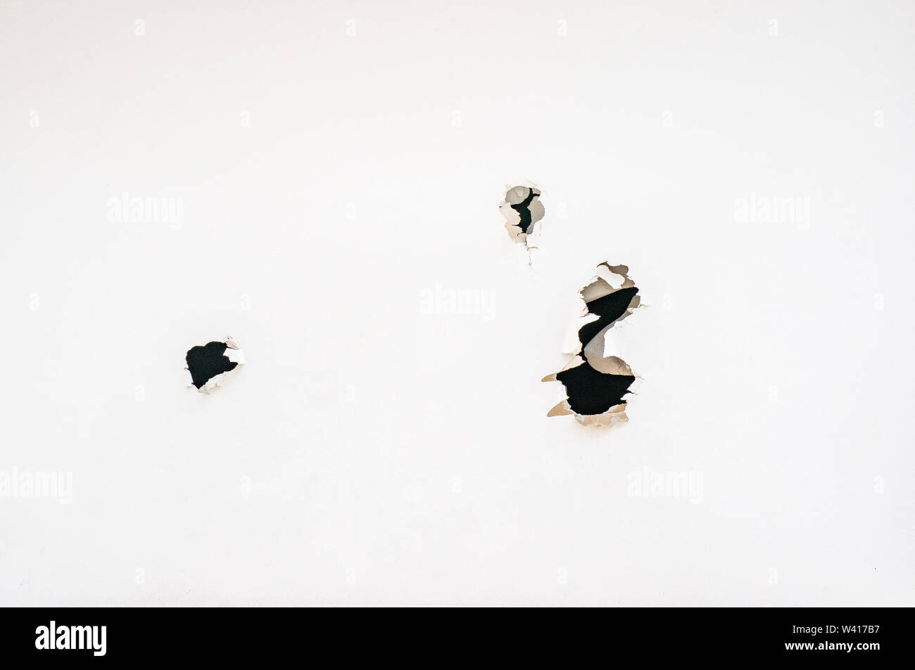 Bullet Holes In Black Paper