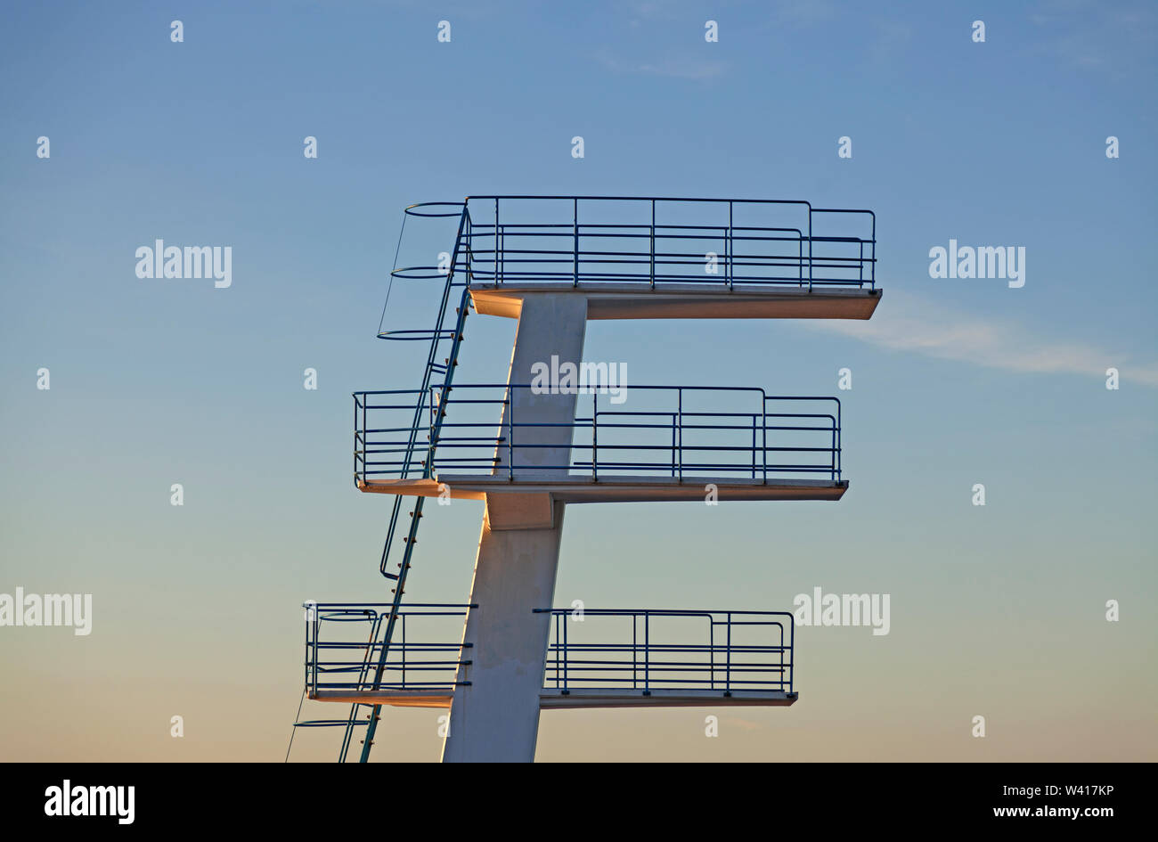 swimming jumping tower in sunset Stock Photo - Alamy