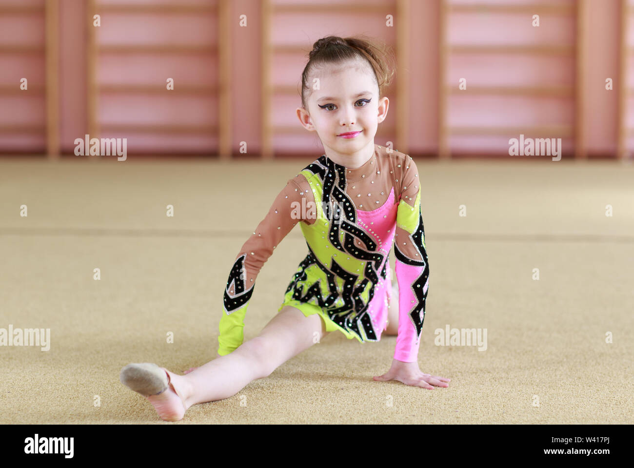 Caucasian girl in gymnastics poses hi-res stock photography and images ...