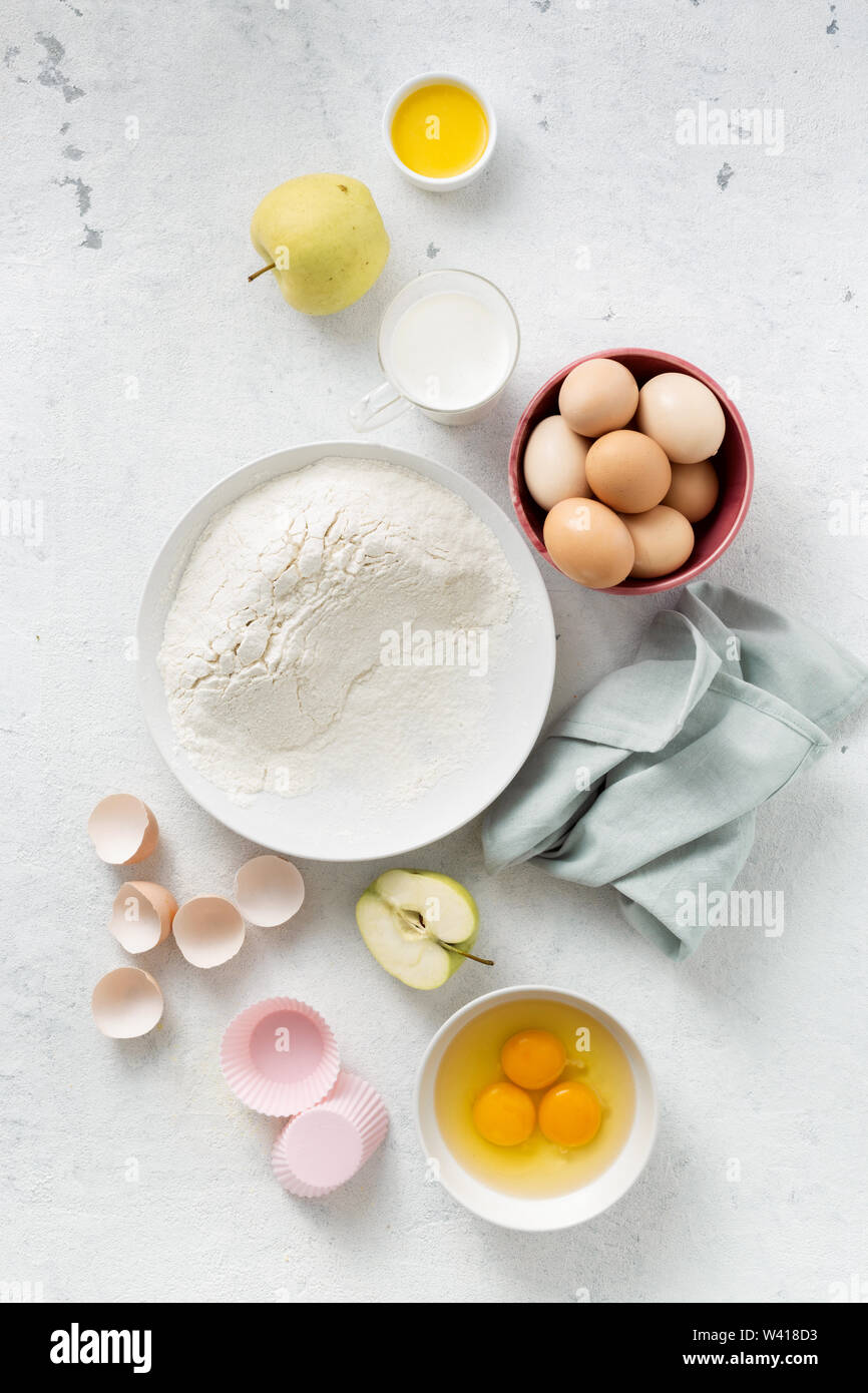 Baking food ingredients on a white background top view Stock Photo - Alamy
