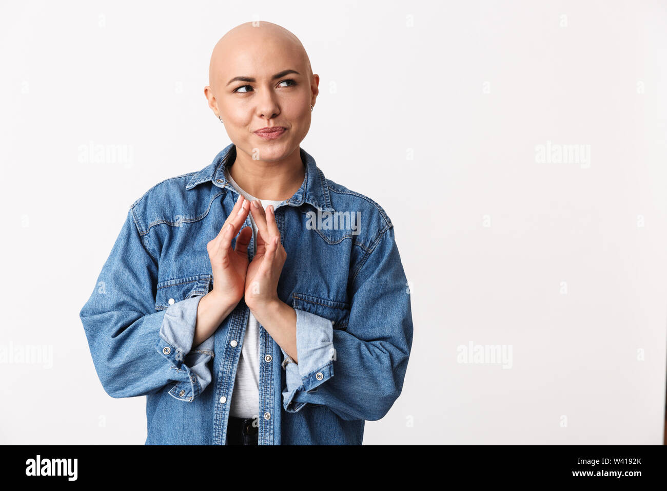 Portrait of a beautiful lovely young hairless woman wearing casual ...