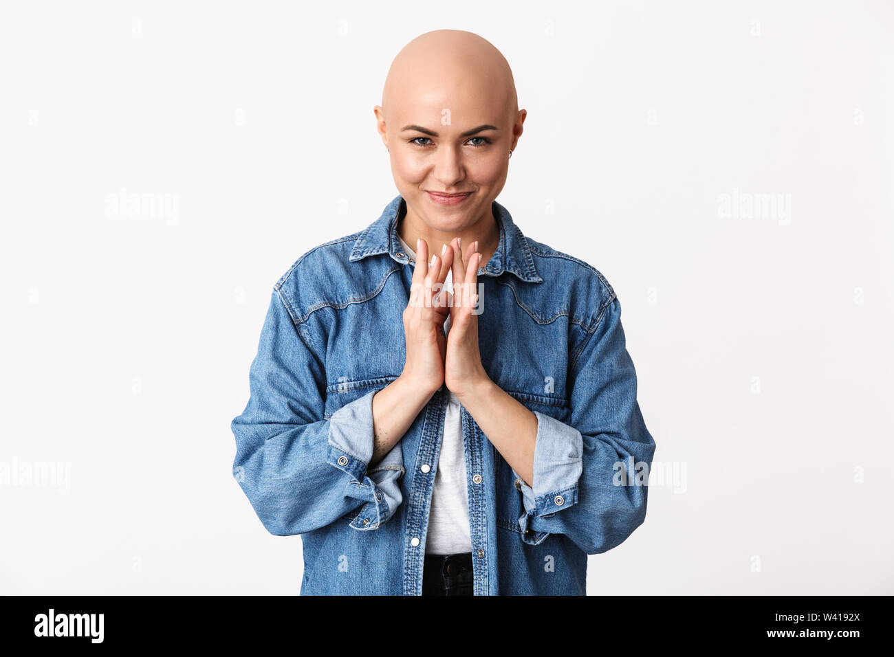 Portrait of a beautiful lovely young hairless woman wearing casual ...