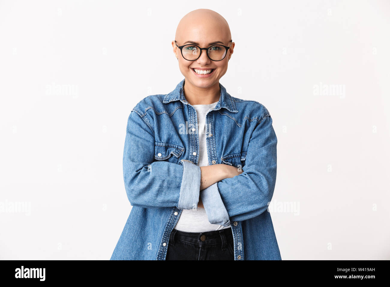 Portrait of a beautiful young hairless woman wearing casual clothes ...