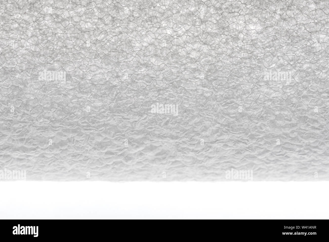 A white extruded polyethylene foam tube texture isolated on white ...