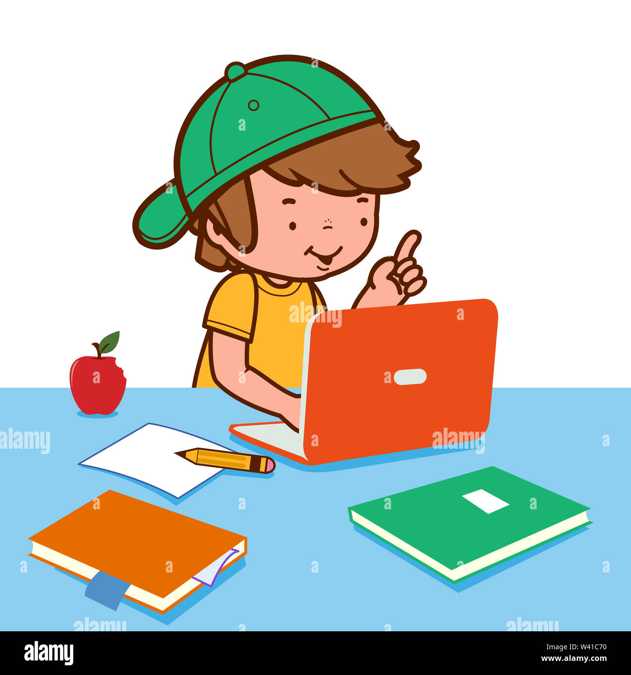 A student boy sitting on his desk in front of his computer at home or ...