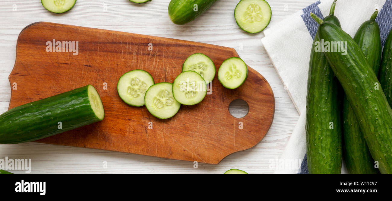 Fresh raw green cucumbers, view from above. Flat lay, top view ...