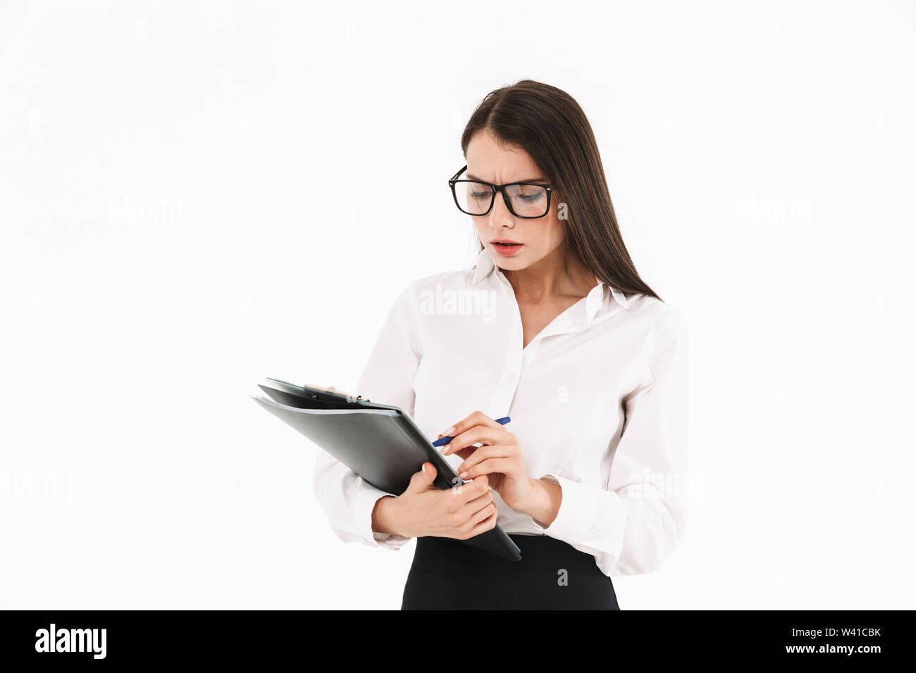 Photo of beautiful female worker businesswoman dressed in formal wear holding bookbinder with ...