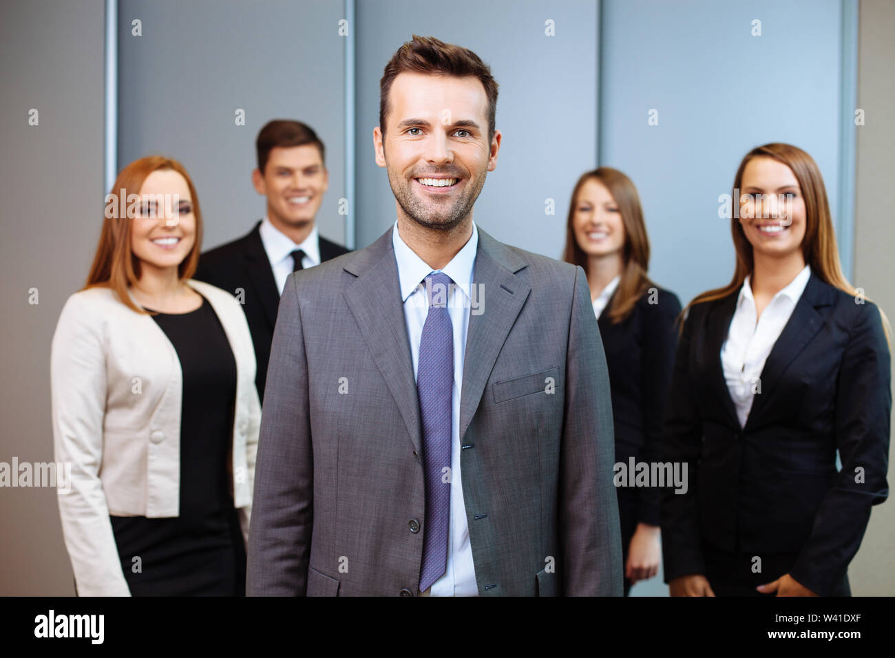 Group of professionals with leader hi-res stock photography and images ...