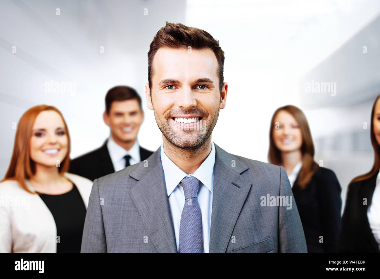 Group of professionals with leader hi-res stock photography and images ...