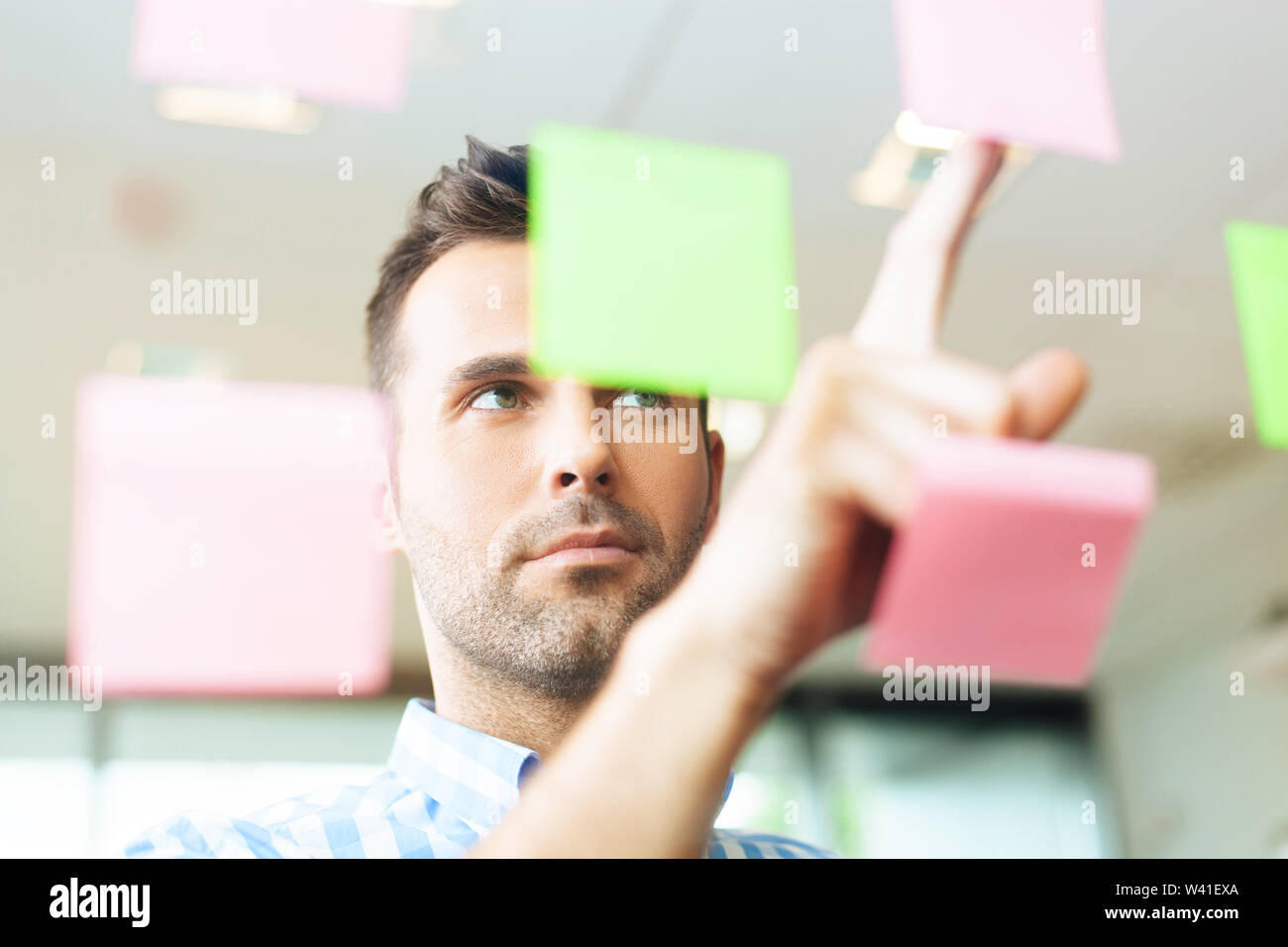 Creative man working in the office Stock Photo - Alamy