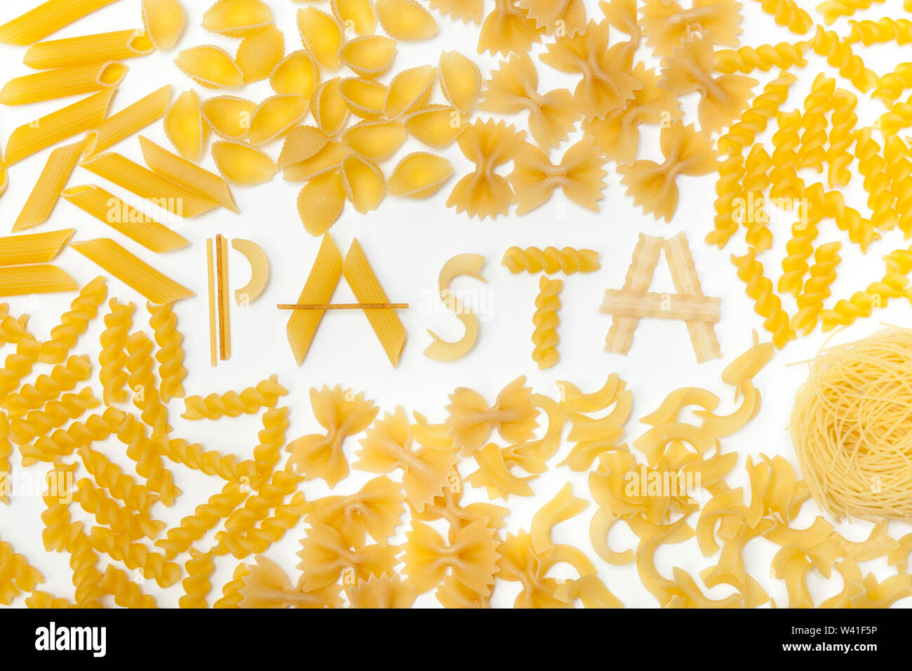 pile of pasta with pasta inscription on a white background Stock Photo ...
