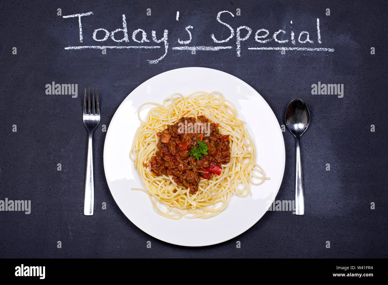 Chalkboard advertising the daily special of Spaghetti Bolognese Stock ...