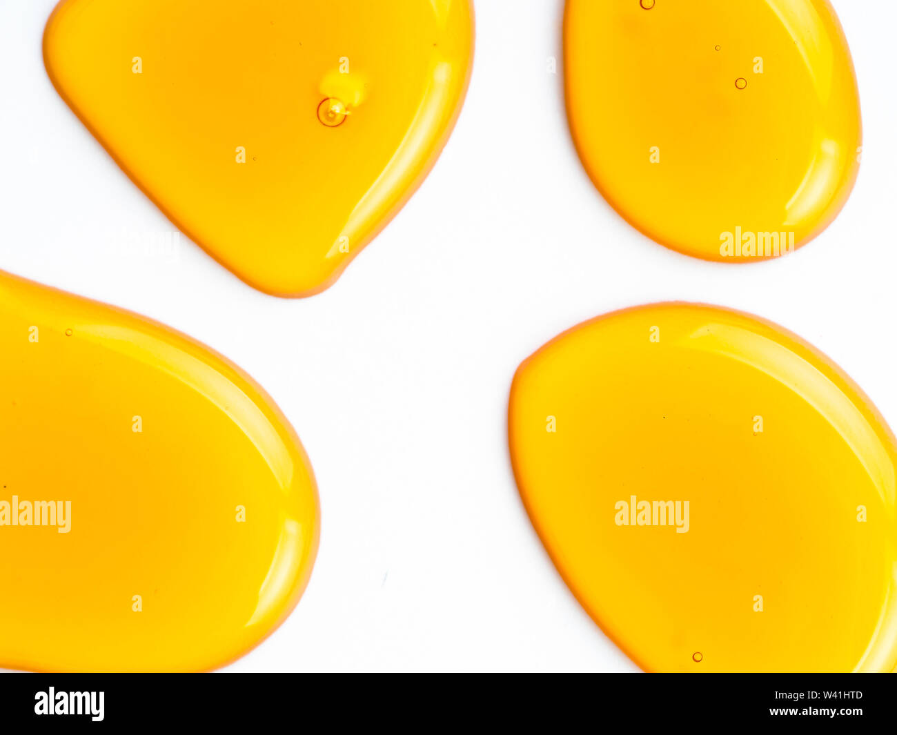 Honey drops. Abstract pattern from honey drops. Isolated on white with ...